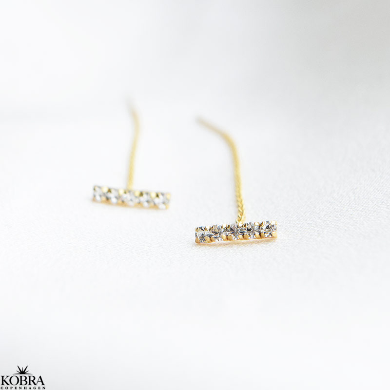 "Brilliant" guld øretråde med hvide sten - Guld øreringe - KOBRA ...